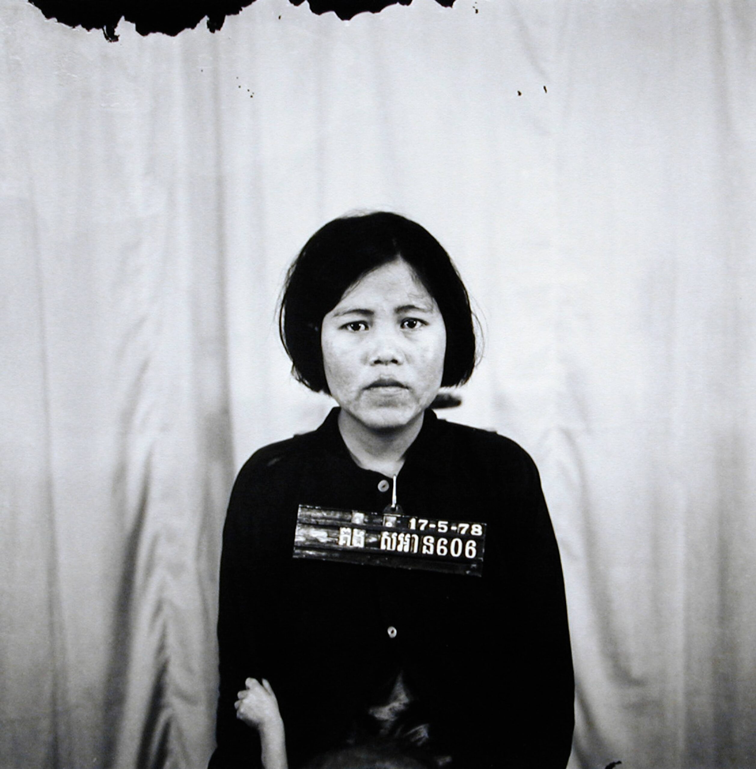 Nhem Ein, Kong Saman and child, prisoners of the Khmer Rouge, 1978 ...