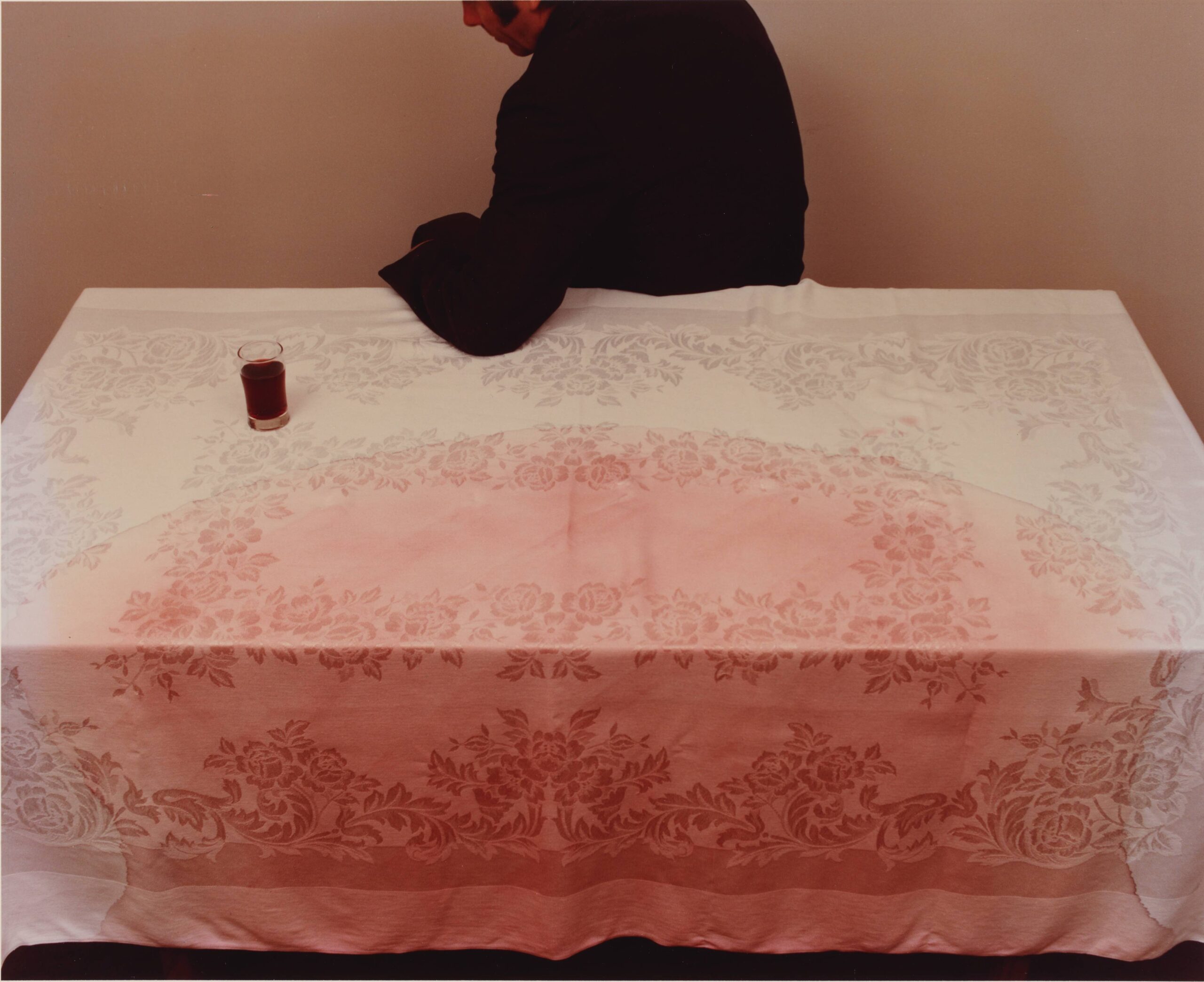Jo Ann Callis, Man at Table, 1977 · SFMOMA
