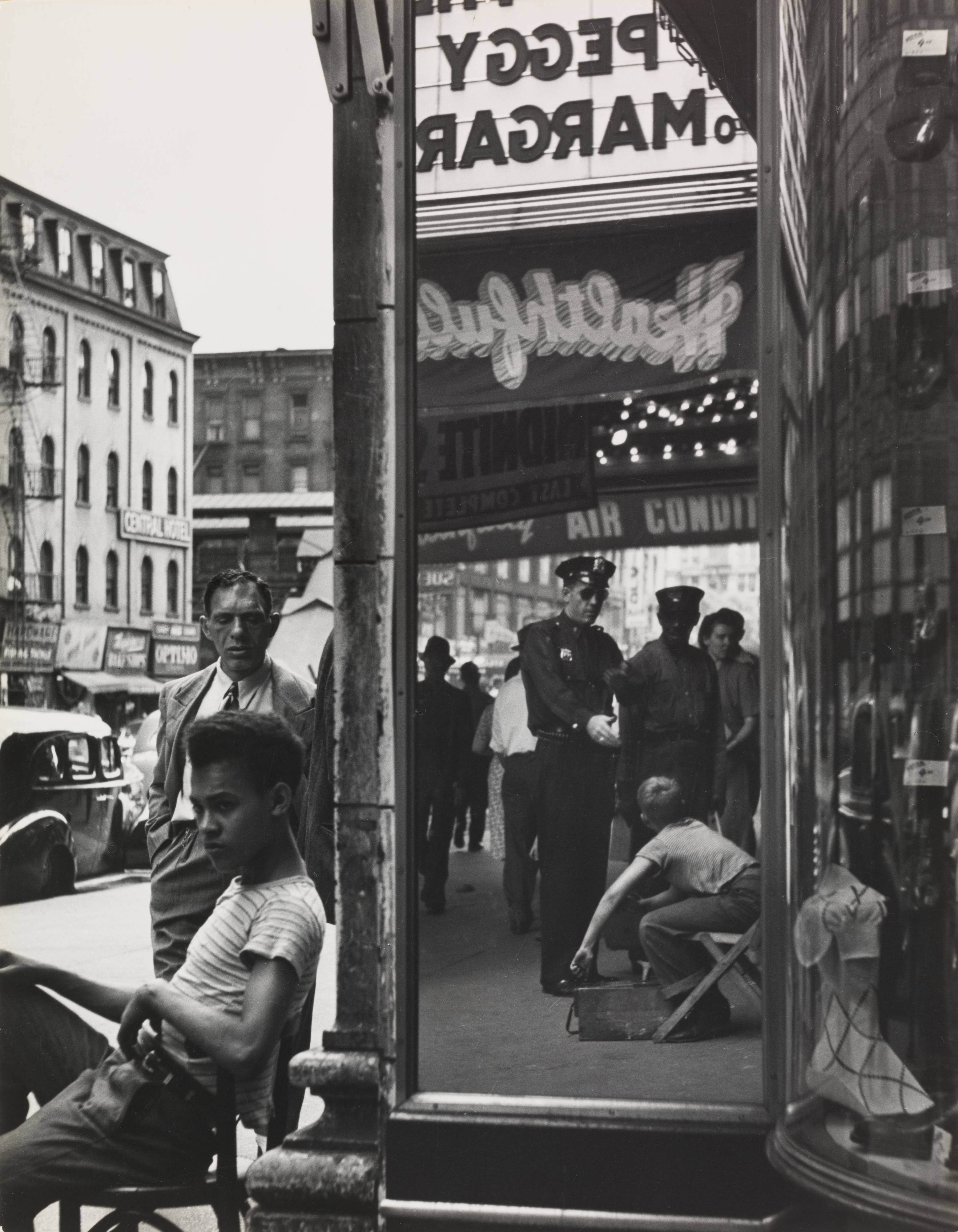 Morris Engel, Shoeshine Boy with Cop, 1947 · SFMOMA