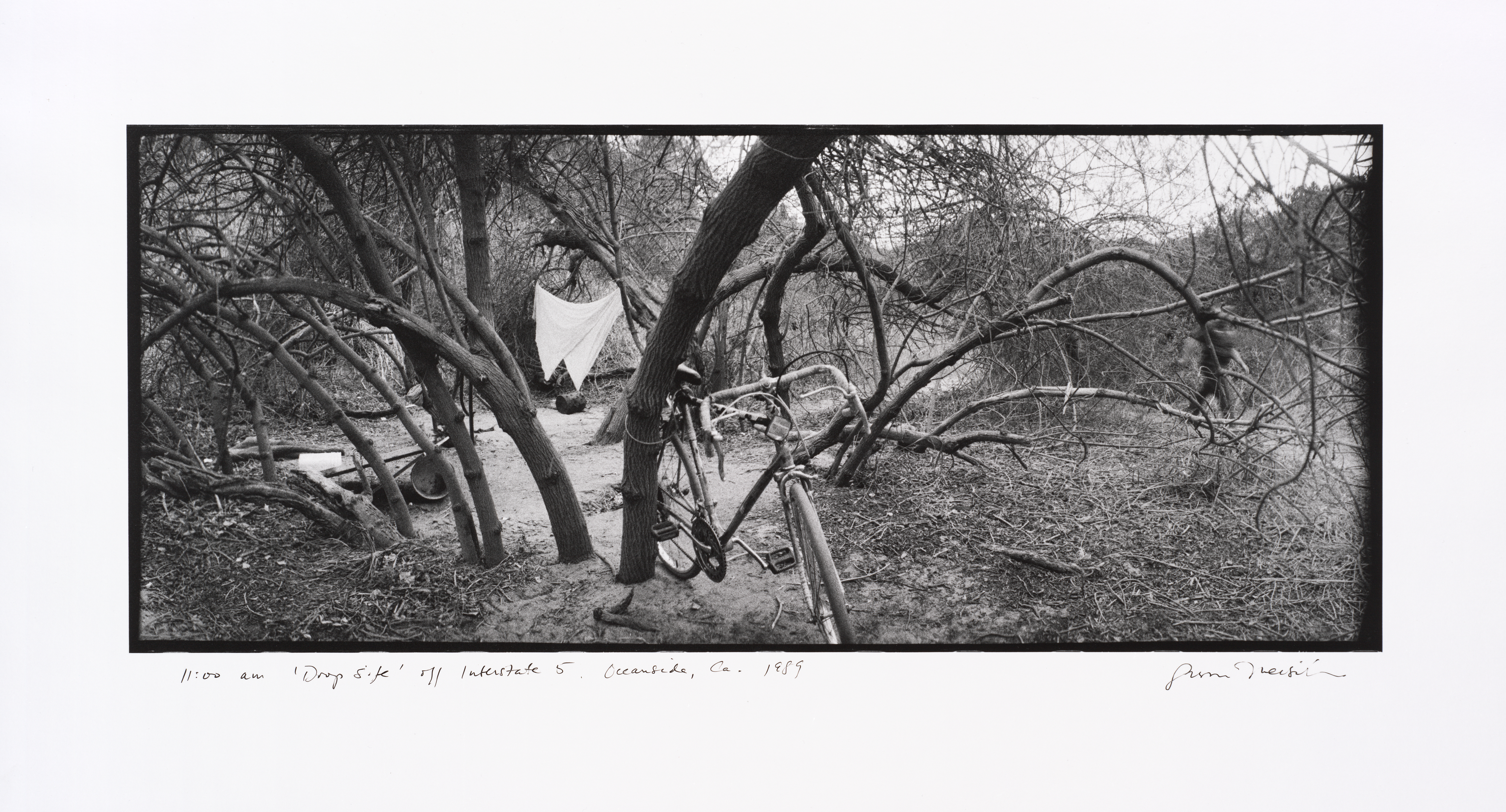 Susan Meiselas, 11:00 am "Drop site" off Interstate 5, Oceanside ...
