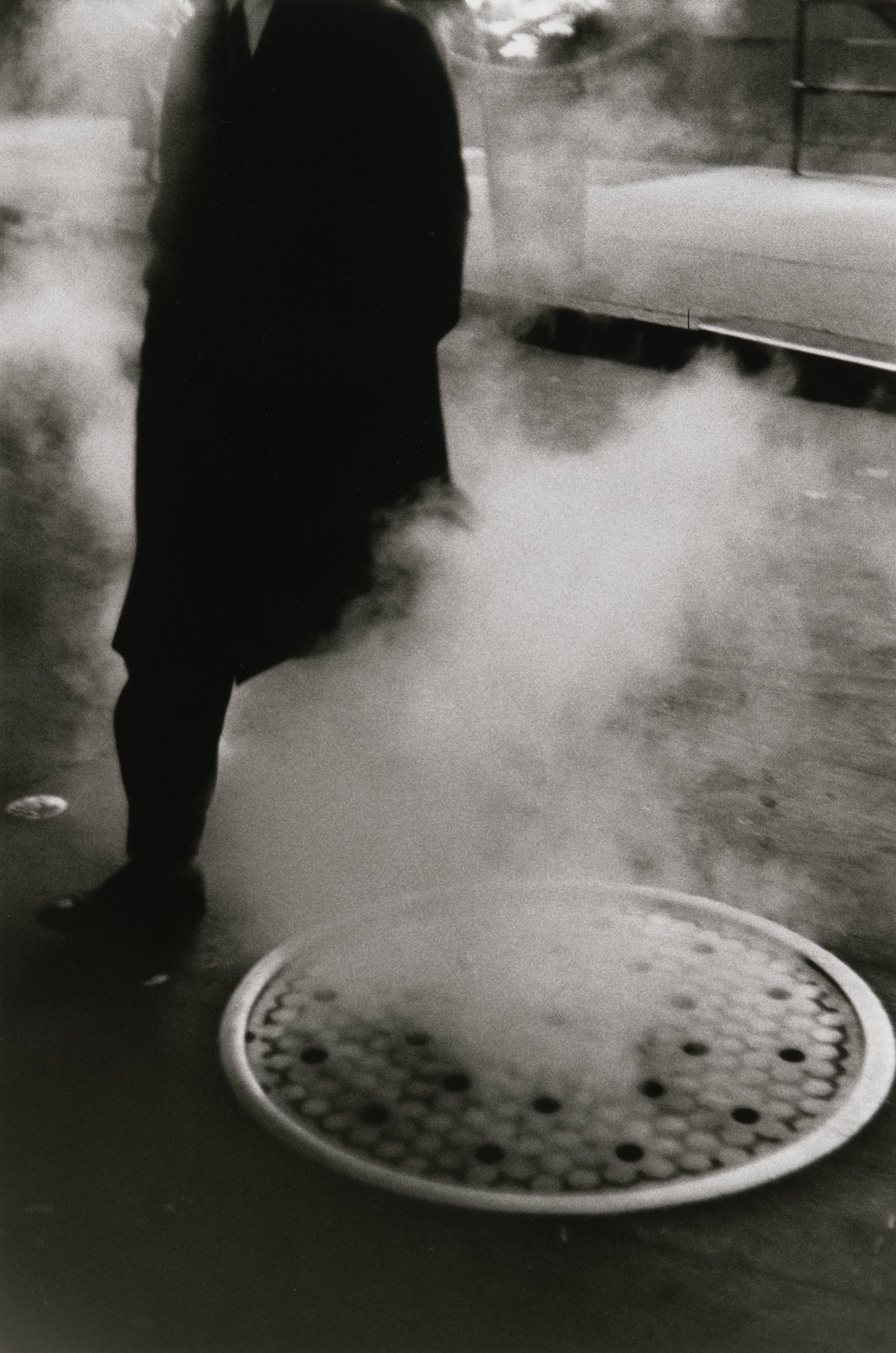 Louis Stettner, Manhole, Times Square, New York, 1954 · SFMOMA